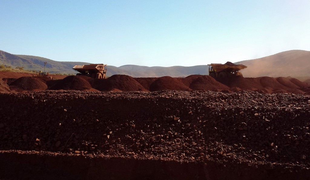 Two Cat 793F CMD (autonomous) trucks at Solomon mine - MINING.COM