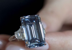 'Oppenheimer Blue' diamond sets new record, fetches $57 million ...
