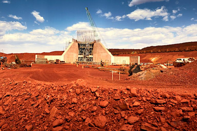 BHP posts 7% rise in iron ore output, flags production hit in Q2 ...
