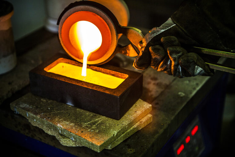 Gold price drops to month-low on rate cut uncertainty - MINING.COM