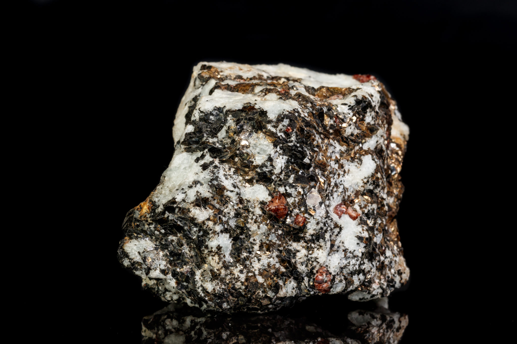 Macro Zircon mineral stone on a black background - MINING.COM